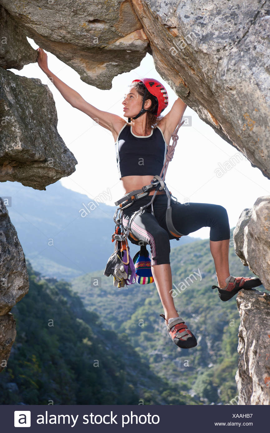 Female On Rock High Resolution Stock Photography and Images - Alamy