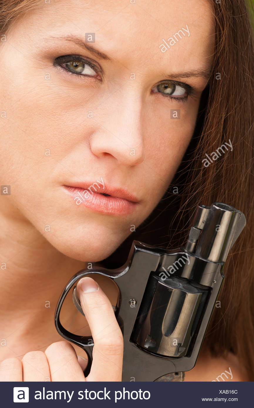 Young Woman Aiming Revolver Stock Photos & Young Woman Aiming Revolver ...