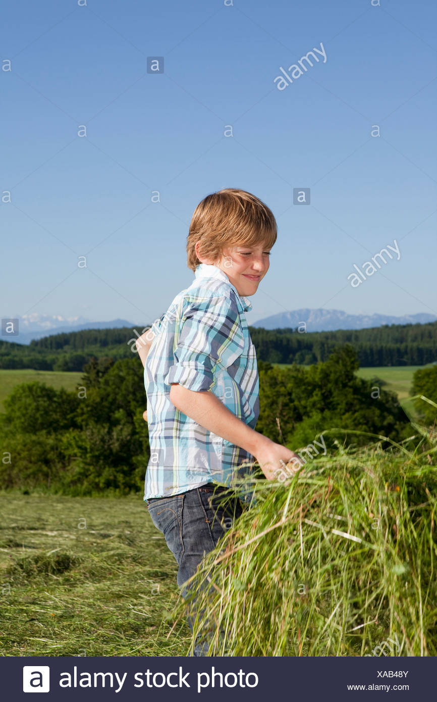 Boy Working Farm High Resolution Stock Photography and Images - Alamy