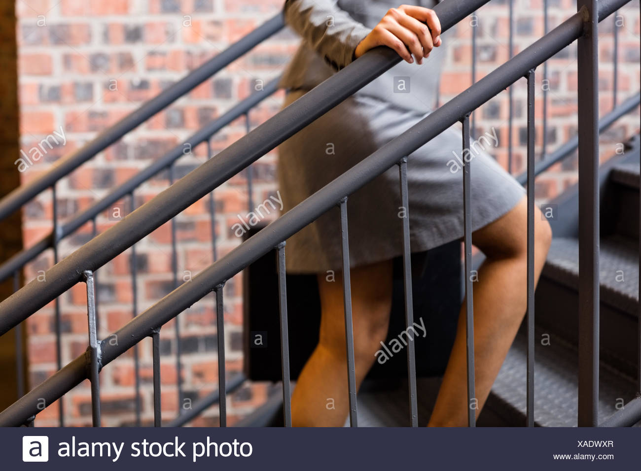 Woman Climbing Window High Resolution Stock Photography and Images - Alamy