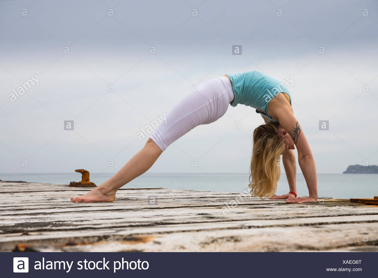Women Yoga Bending Over High Resolution Stock Photography and Images ...