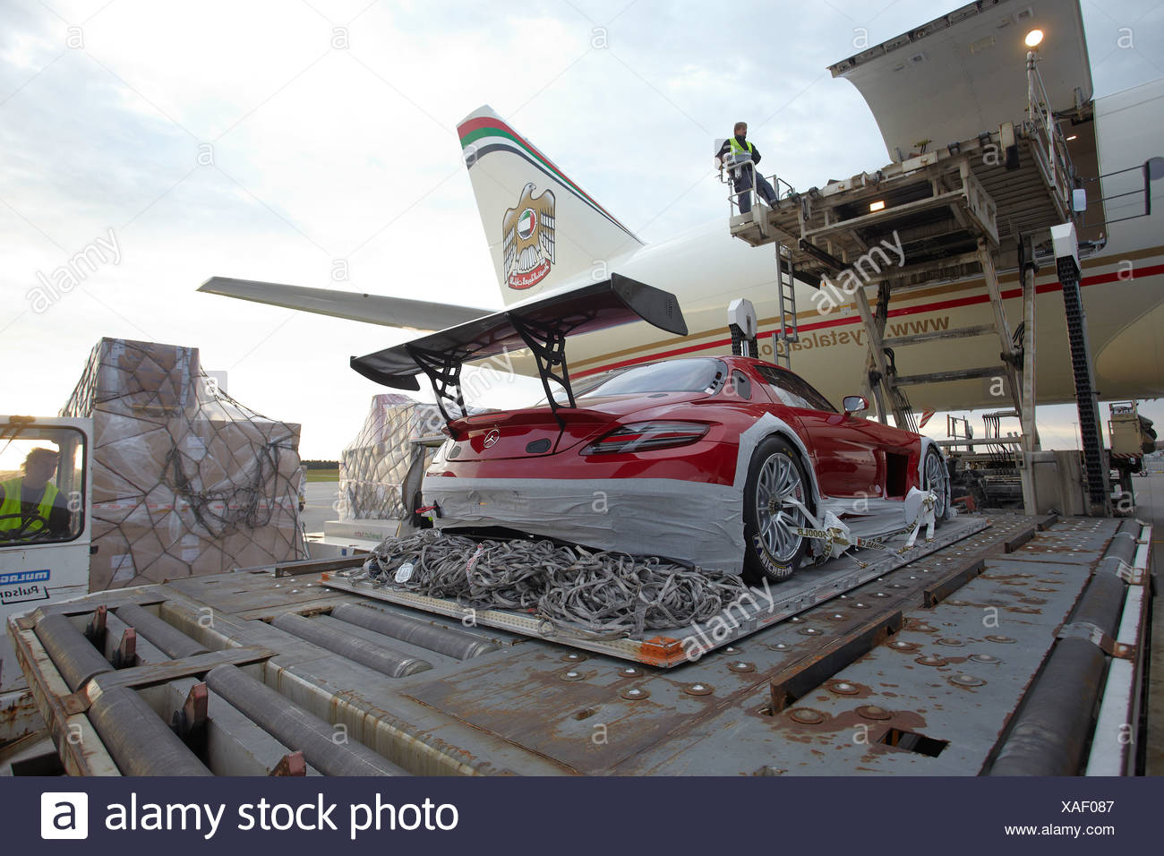 Loading Airplanes At An Airport High Resolution Stock Photography and ...