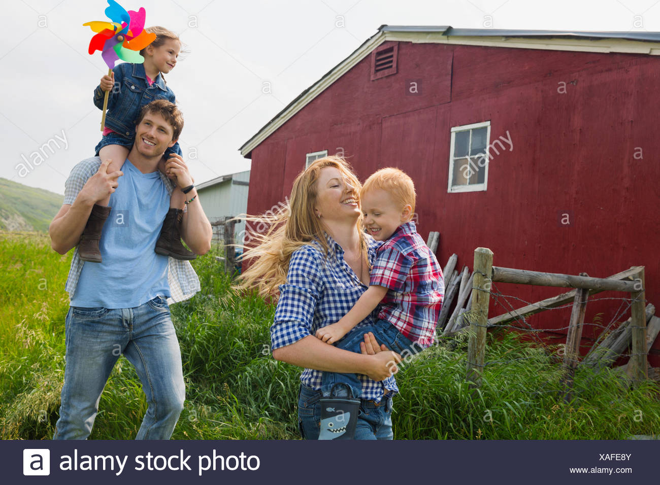 Father Carrying Daughter On Shoulders Stock Photos & Father Carrying ...