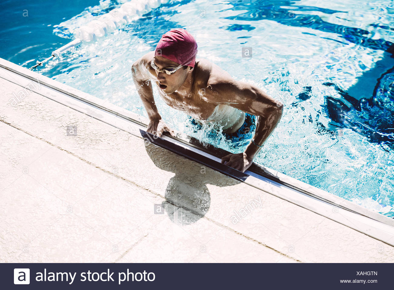 Climbing Out Of Swimming Pool High Resolution Stock Photography and ...