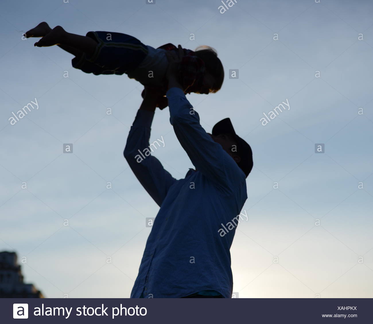 Man Carrying His Family Some High Resolution Stock Photography and ...