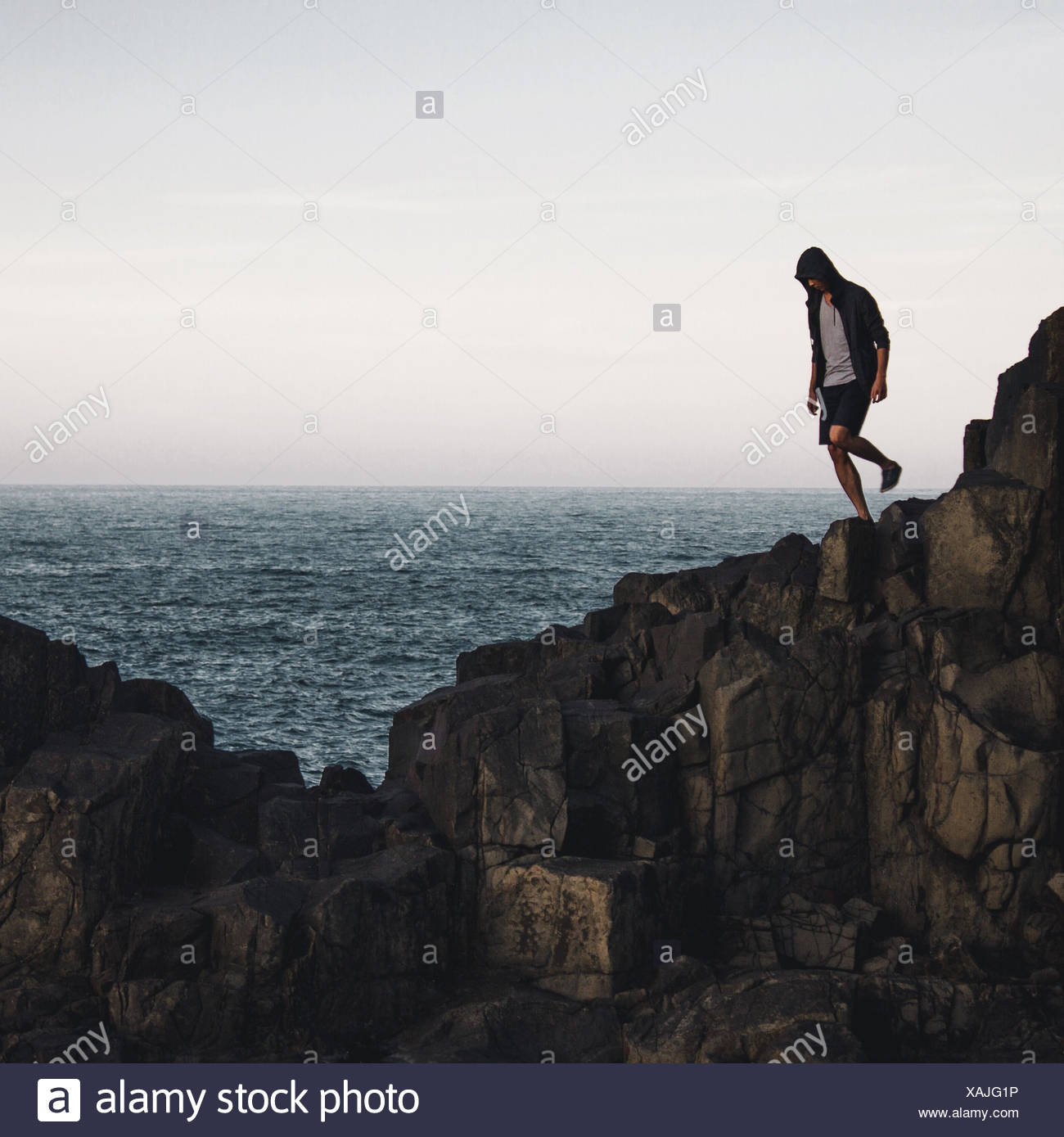 Person Standing On Cliff Edge High Resolution Stock Photography and ...