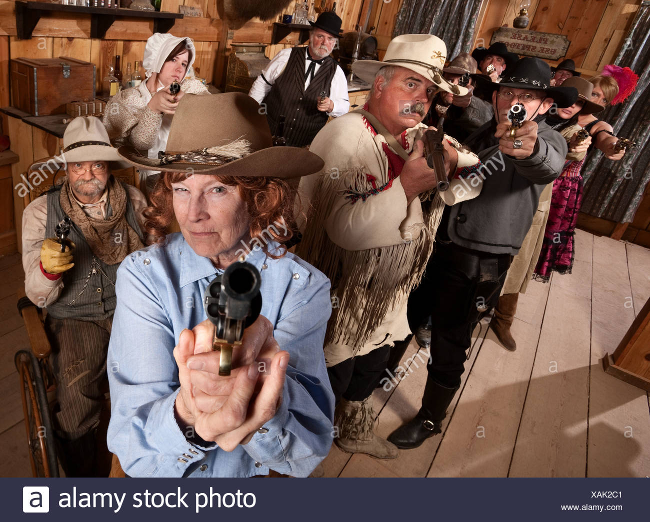 Woman Points Gun High Resolution Stock Photography and Images - Alamy