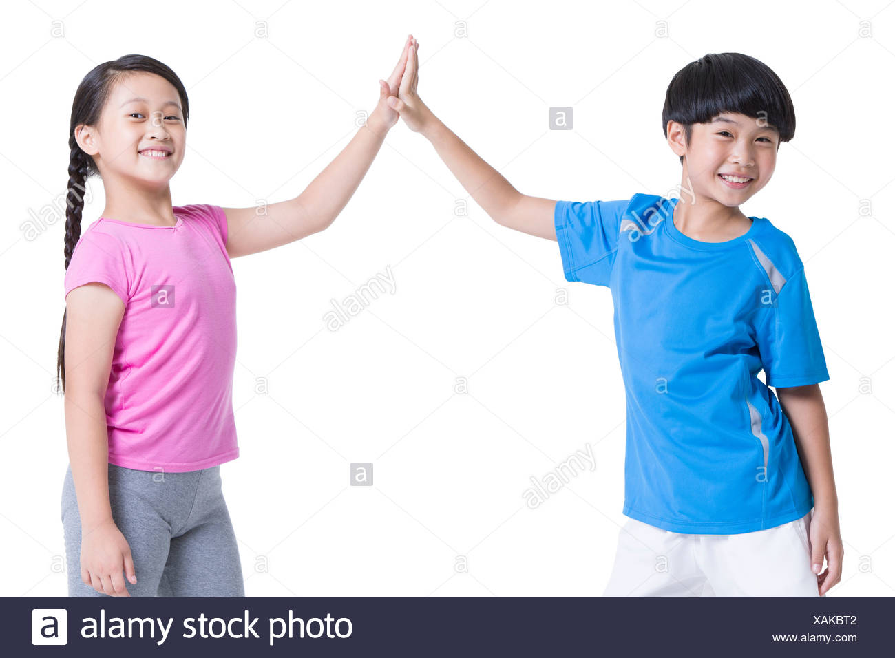 Boys Giving High Five High Resolution Stock Photography and Images - Alamy