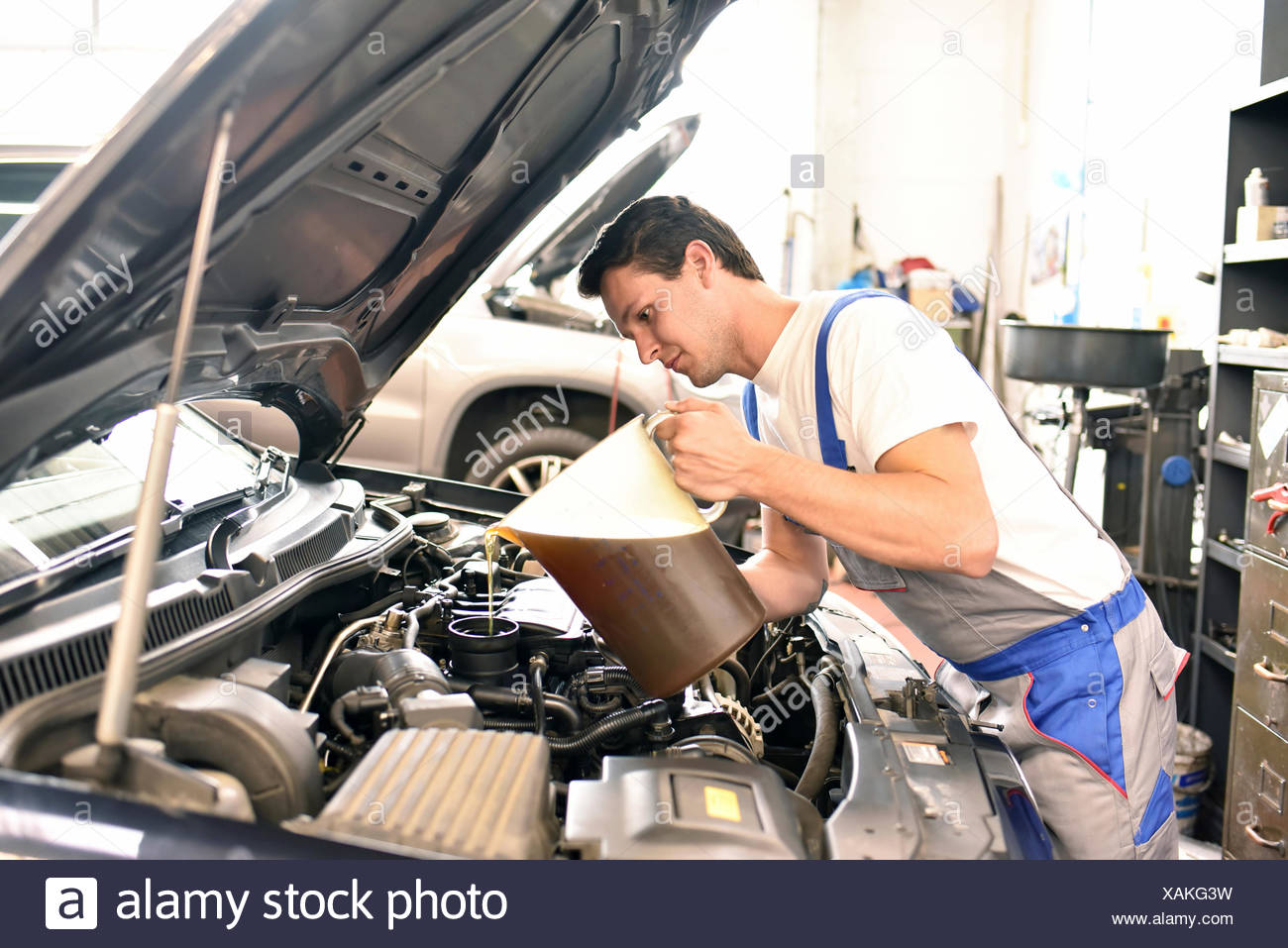 Changing Oil High Resolution Stock Photography and Images - Alamy