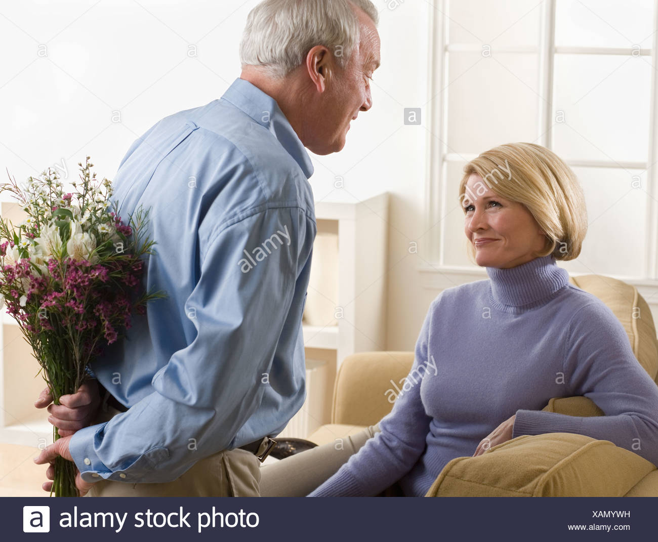 Man Giving Woman Flowers High Resolution Stock Photography and Images ...