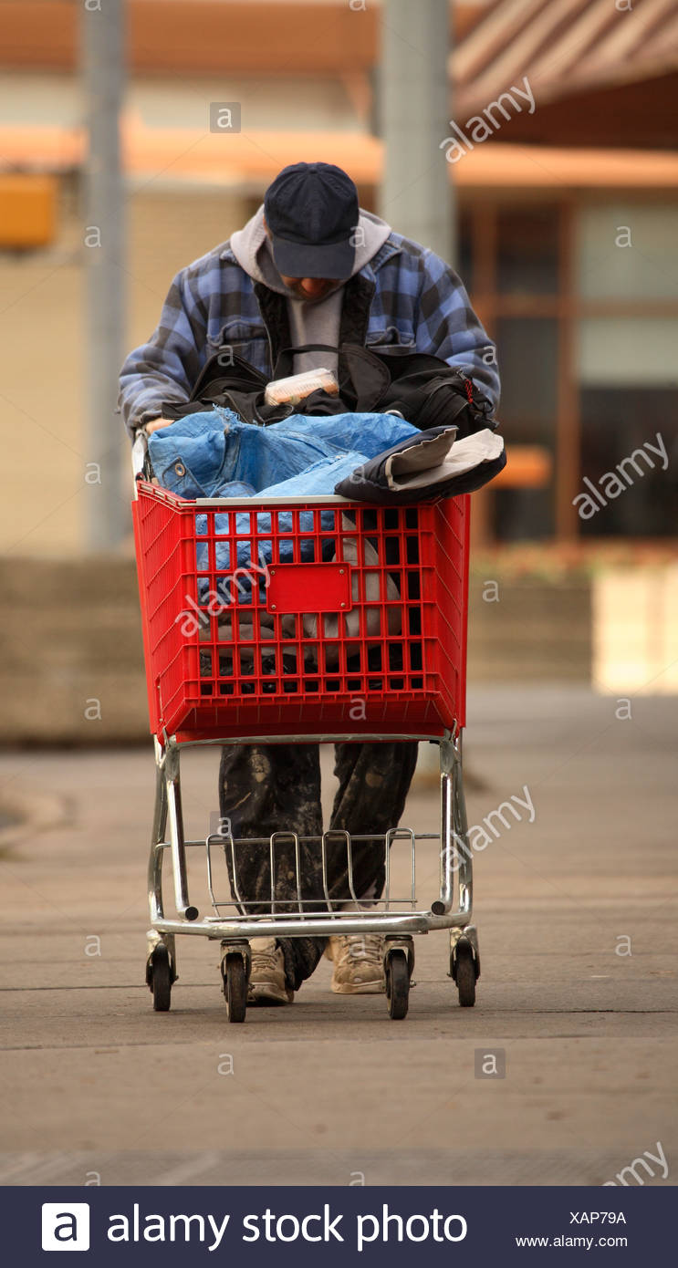 Homeless Man Pushing Shopping Cart High Resolution Stock Photography ...