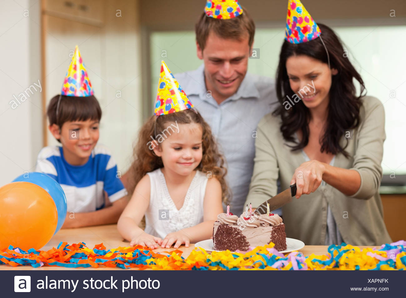 Girl Cutting Birthday Cake High Resolution Stock Photography and Images ...