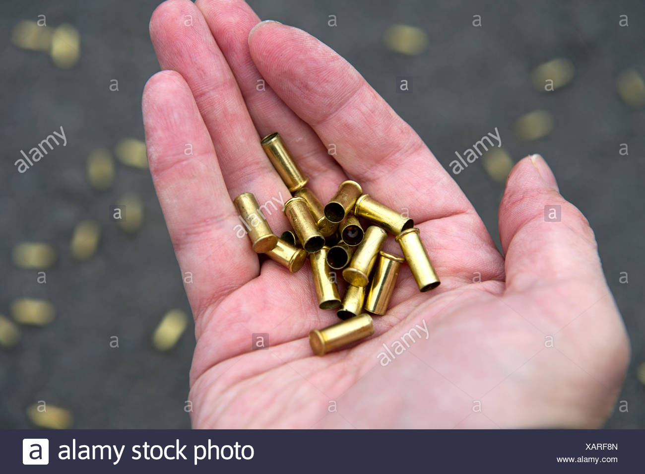 Hand Gun Bullet High Resolution Stock Photography and Images - Alamy