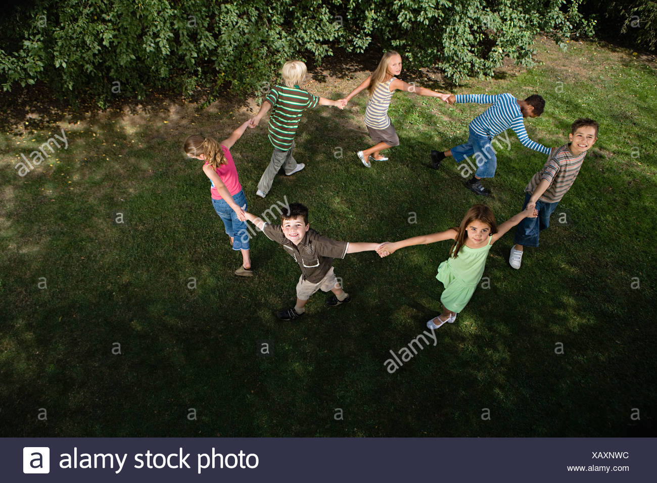 Children Spinning Circle Stock Photos & Children Spinning Circle Stock ...