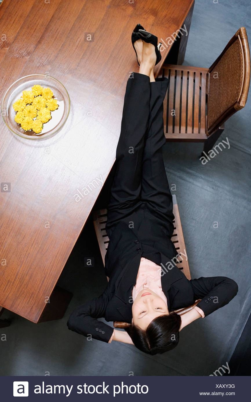 Feet On The Table Stock Photos & Feet On The Table Stock Images - Alamy