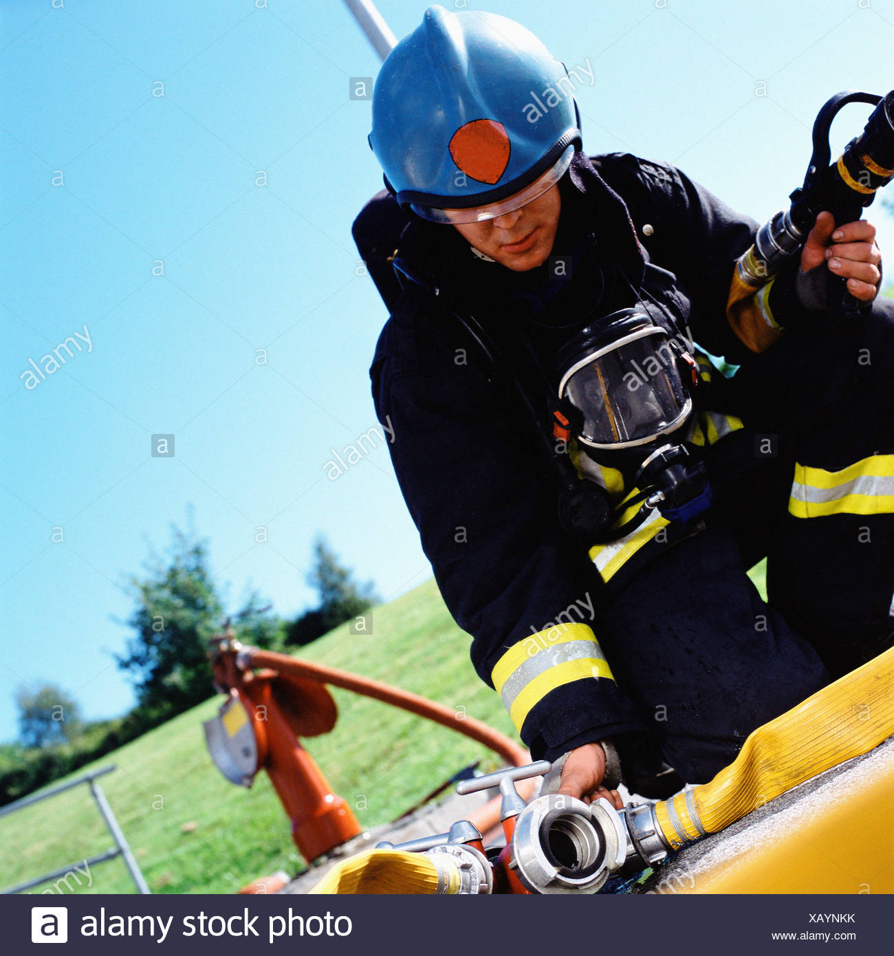 Fireman Hose High Resolution Stock Photography and Images - Alamy