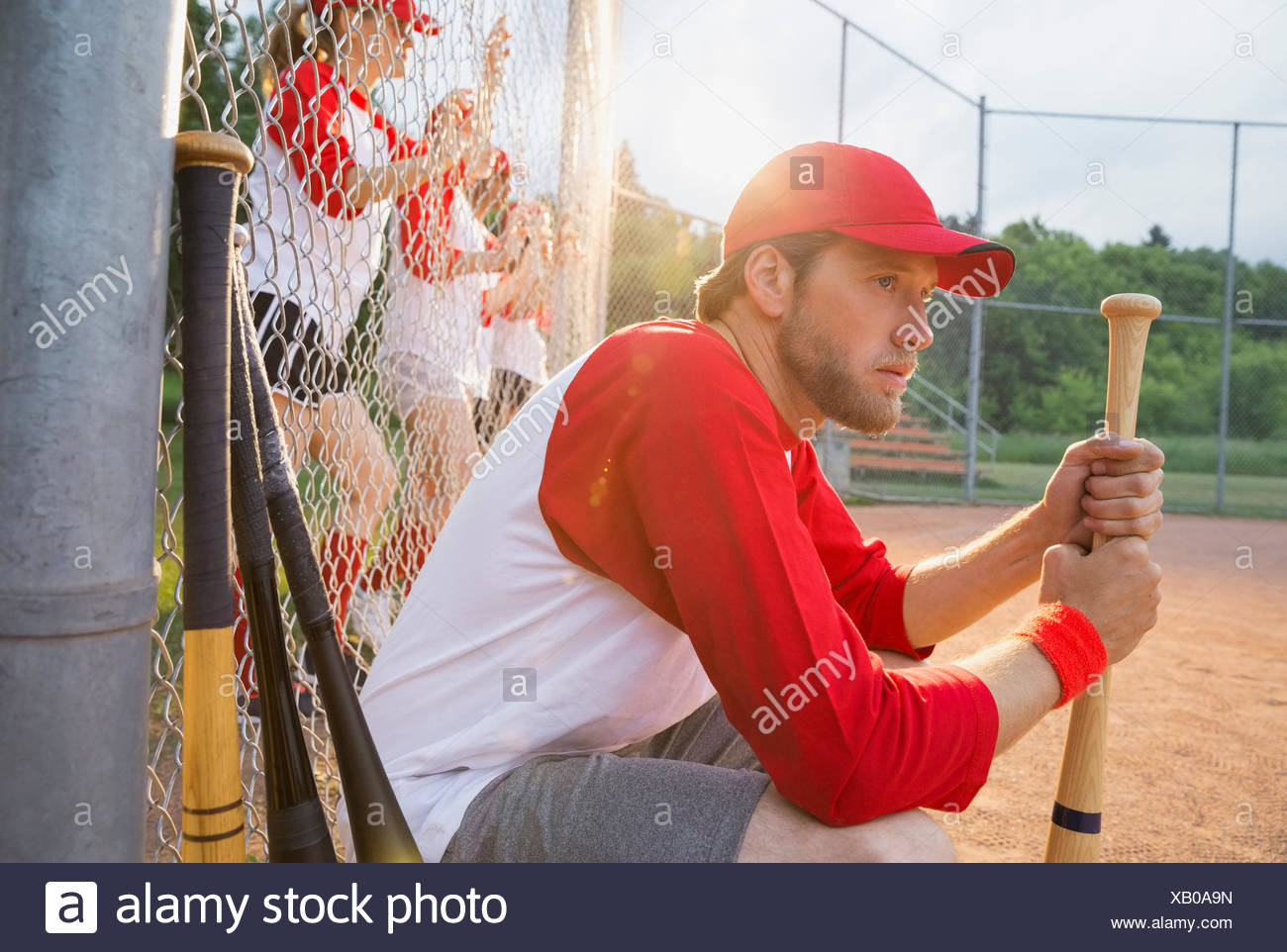 Baseball Player Holding Bat Stock Photos & Baseball Player Holding Bat ...