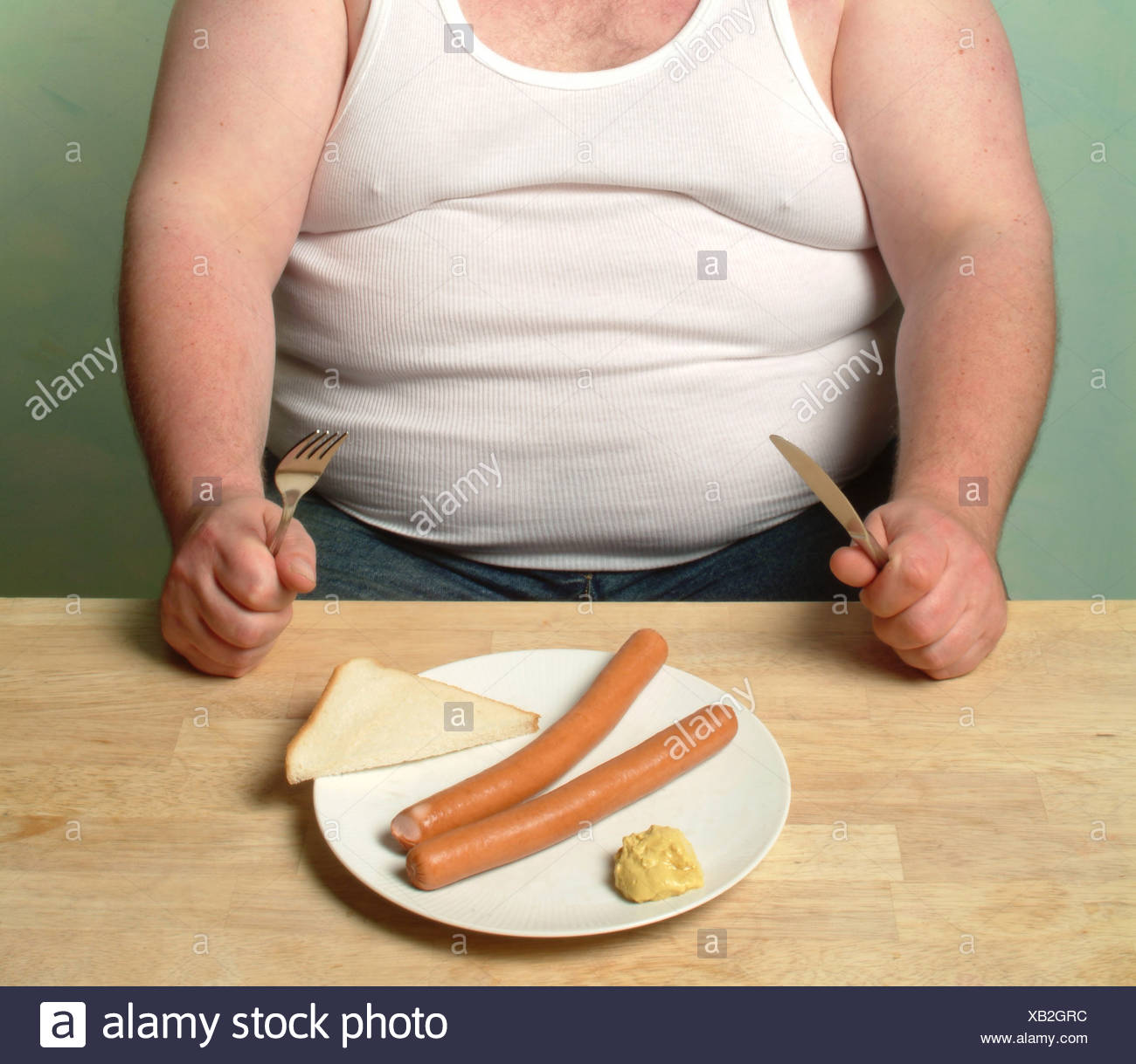 Fat Man In Undershirt Sitting High Resolution Stock Photography and ...