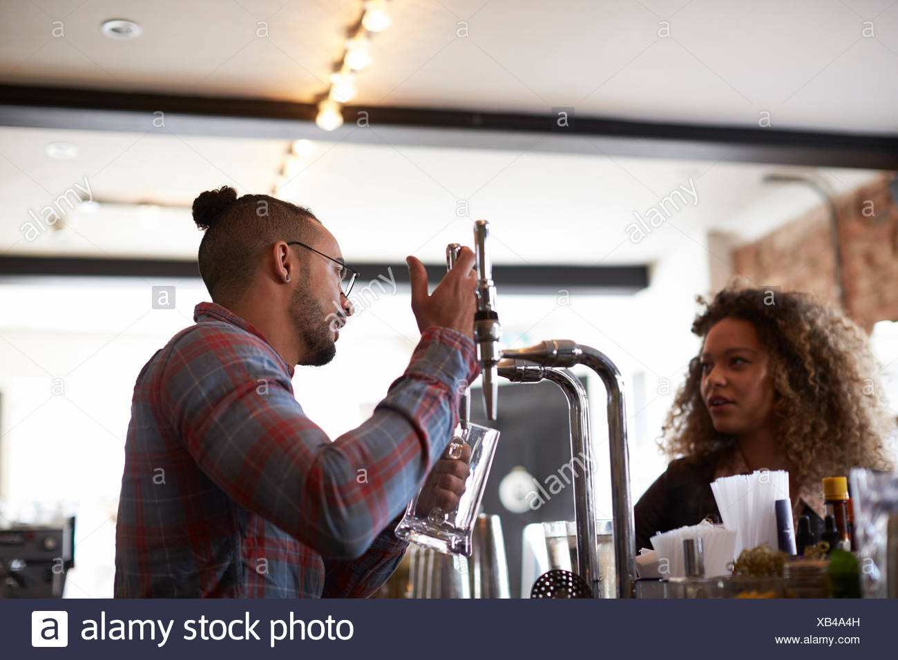 Female Bartender Glass High Resolution Stock Photography and Images - Alamy