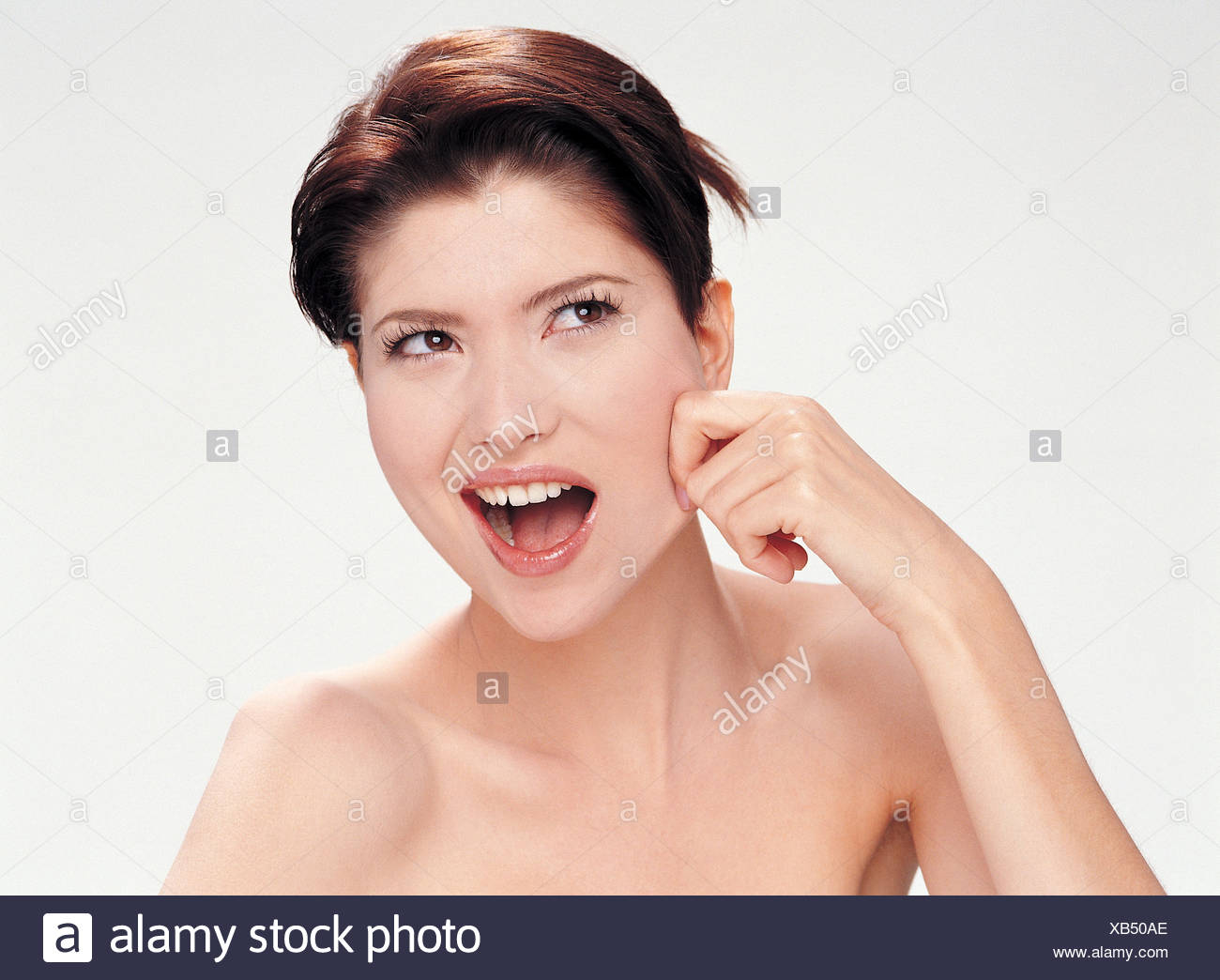 Pinching Cheek High Resolution Stock Photography and Images - Alamy