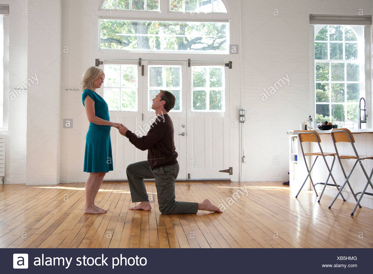 Man On One Knee High Resolution Stock Photography and Images - Alamy
