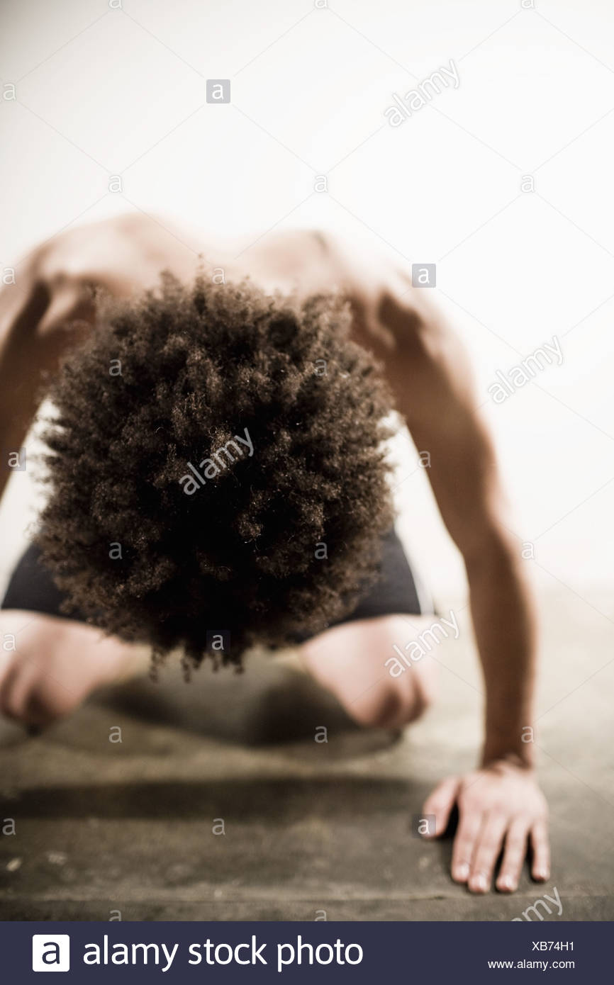 Man Kneeling Head Down Stock Photos & Man Kneeling Head Down Stock ...