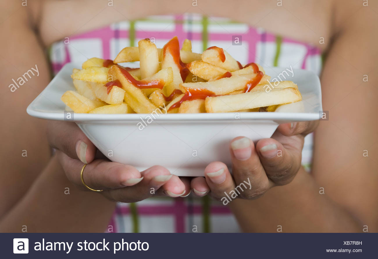 Hand Holding French Fries In High Resolution Stock Photography and ...