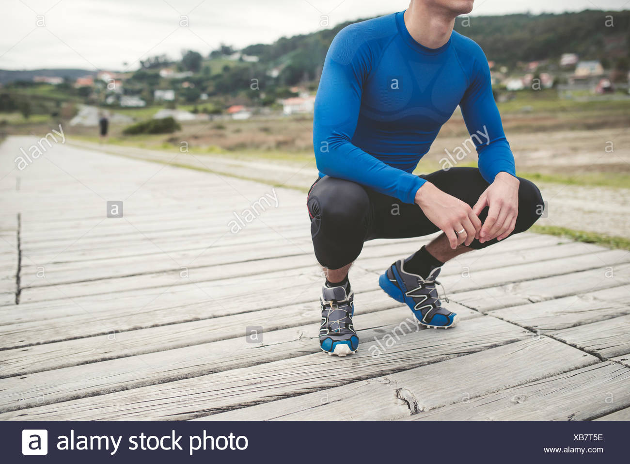 Squatting Squat High Resolution Stock Photography and Images - Alamy
