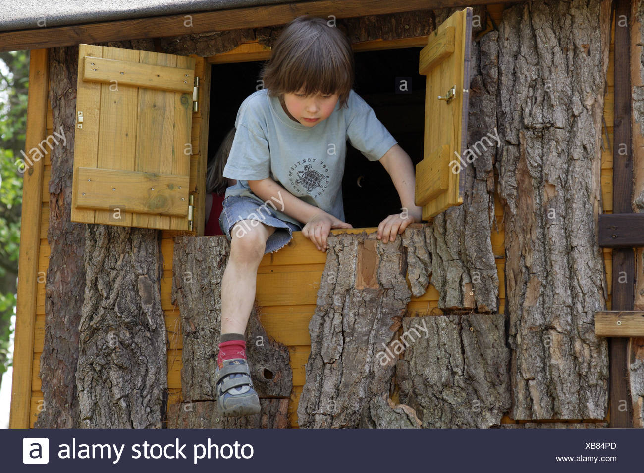 Man Climbing Out Of Window High Resolution Stock Photography and Images ...