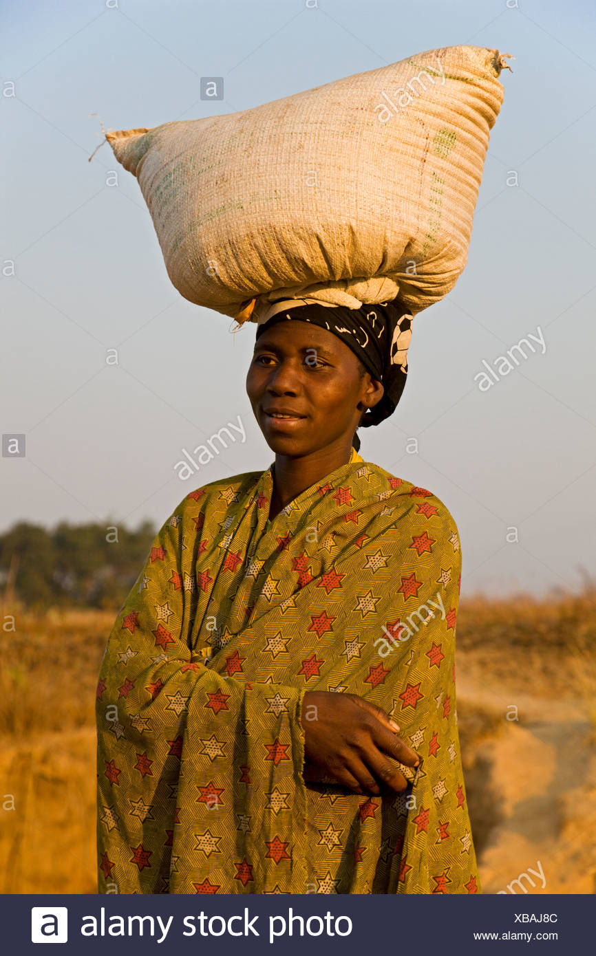 Woman Carrying A Sack High Resolution Stock Photography and Images - Alamy