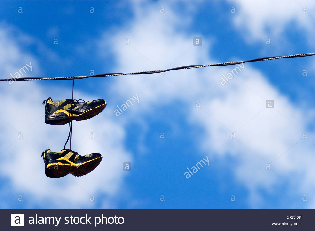 Shoes Hanging From Wires Stock Photos & Shoes Hanging From Wires Stock ...