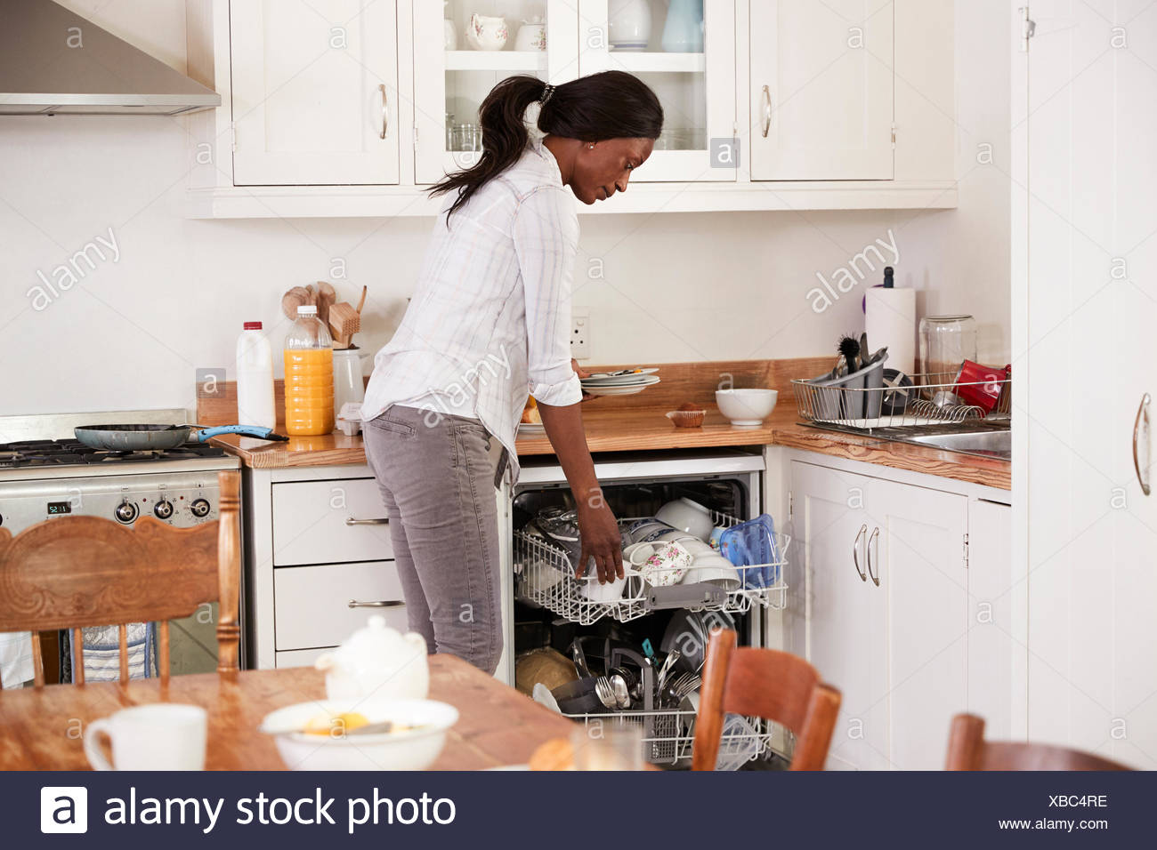 Clearing Dishes High Resolution Stock Photography and Images - Alamy