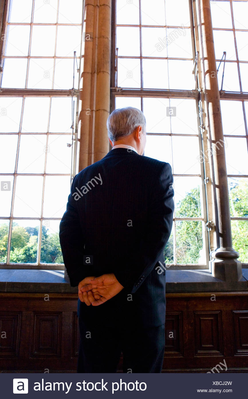Arms Behind Back Stock Photos & Arms Behind Back Stock Images - Alamy