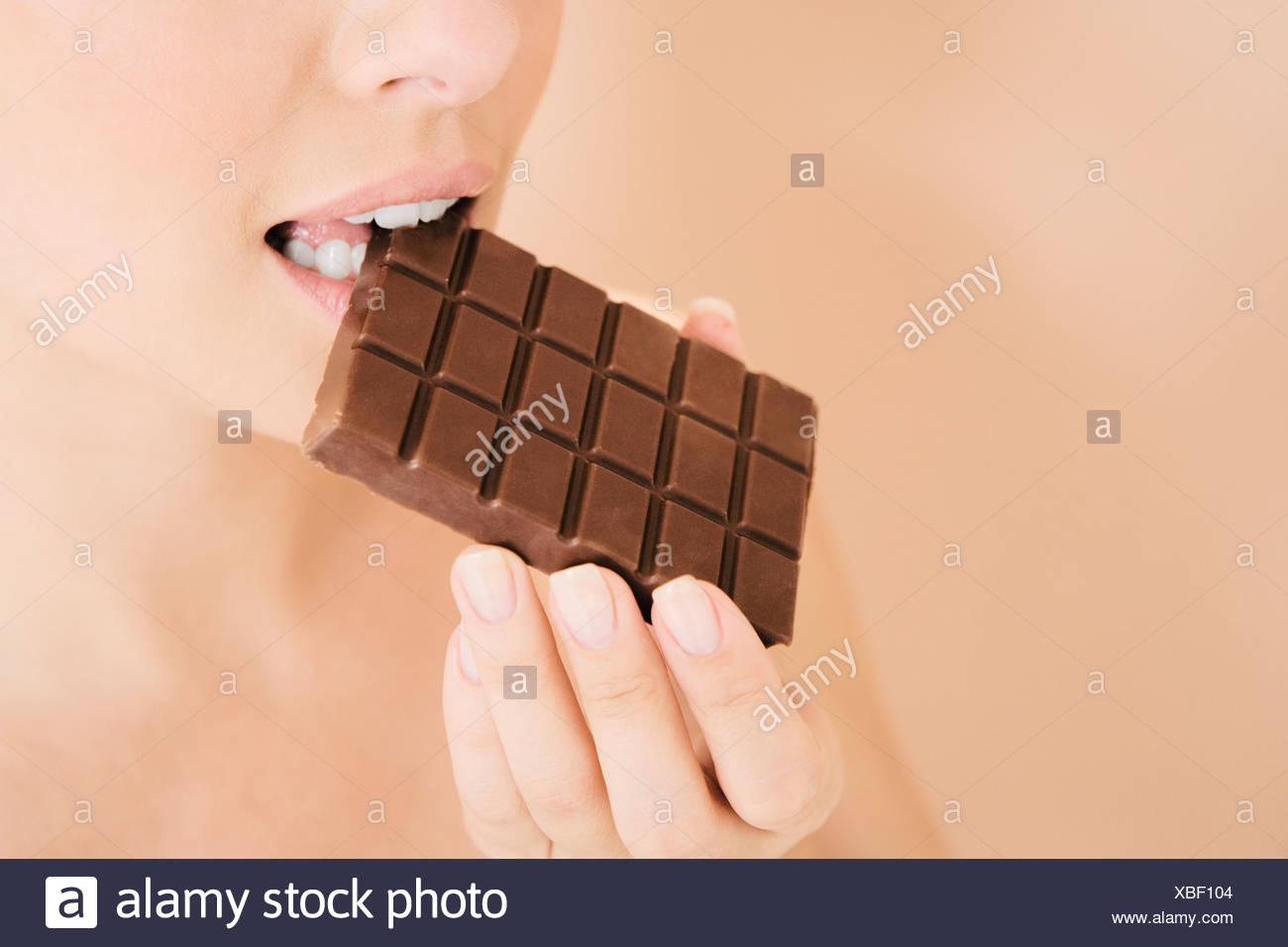 Young Fat Woman Eating Chocolate Stock Photos & Young Fat Woman Eating ...