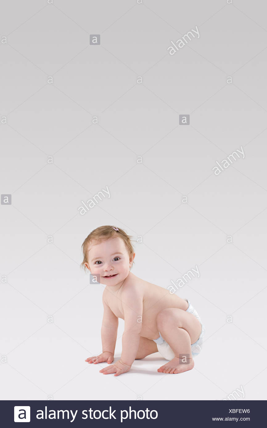 Baby Girl Diaper Crawling High Resolution Stock Photography and Images ...