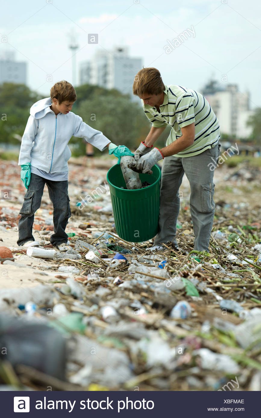 People Collecting Plastic Bottles Recycling Stock Photos & People ...