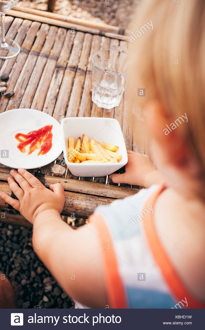 Child Fries Eating High Resolution Stock Photography and Images - Alamy