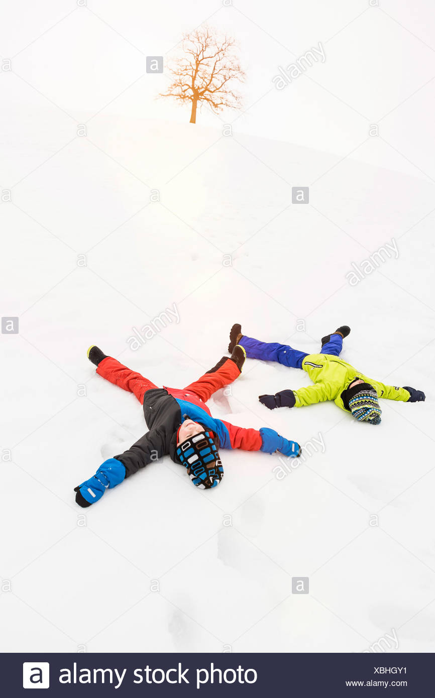 Child Making Snow Angel High Resolution Stock Photography and Images ...