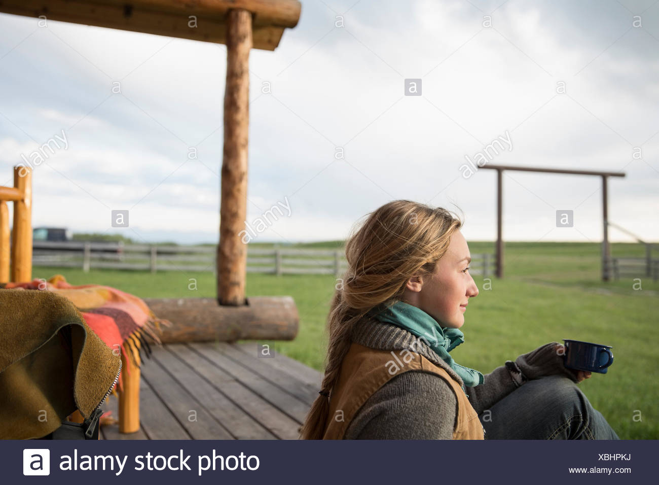 Young Woman Sitting On Porch Stock Photos & Young Woman Sitting On ...