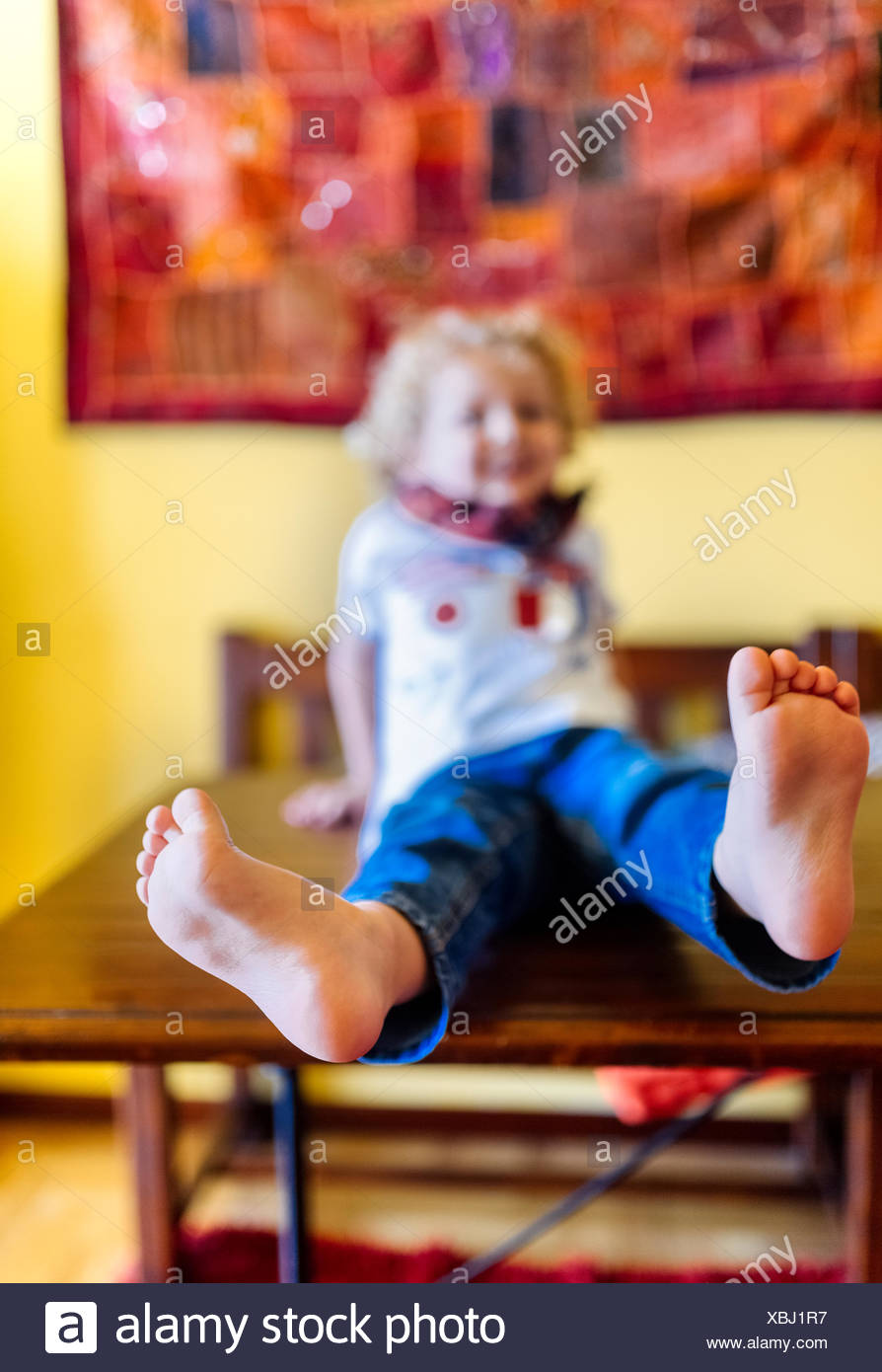 Feet On The Table Stock Photos & Feet On The Table Stock Images - Alamy