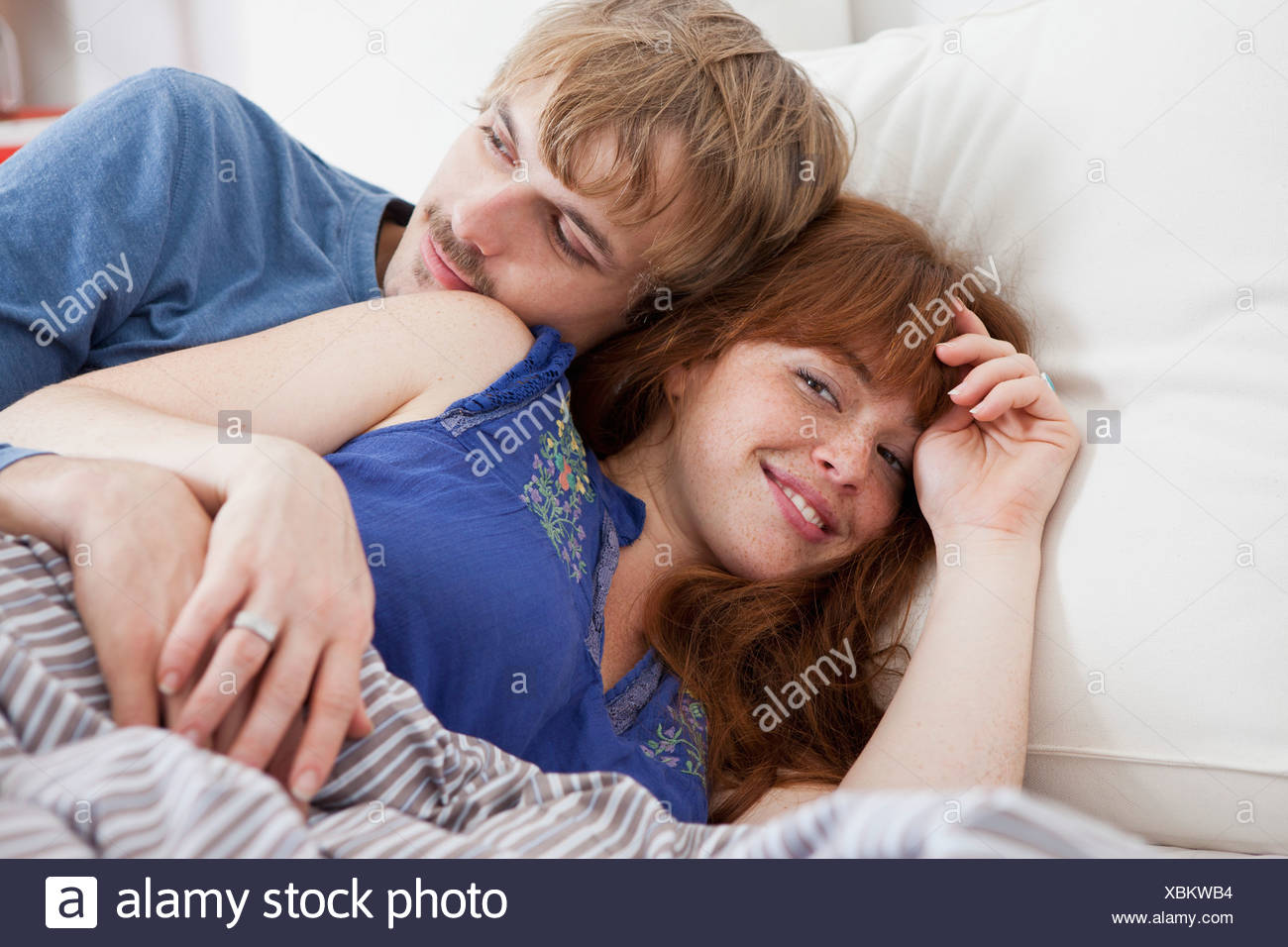 Man Woman Snuggling In Bed High Resolution Stock Photography and Images ...