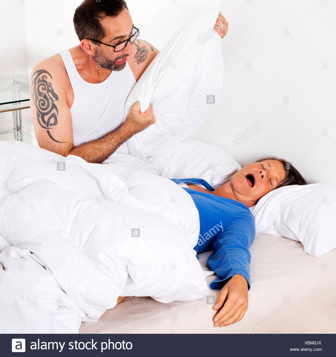 Angry Couple In Bed Stock Photos & Angry Couple In Bed Stock Images - Alamy