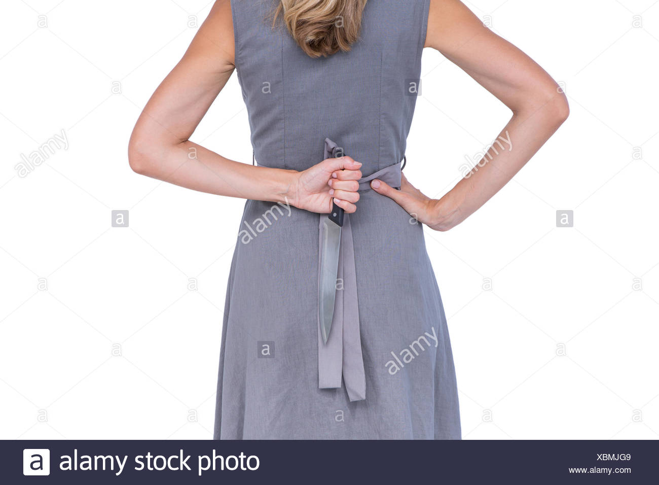 Knife Behind Back Stock Photos & Knife Behind Back Stock Images - Alamy