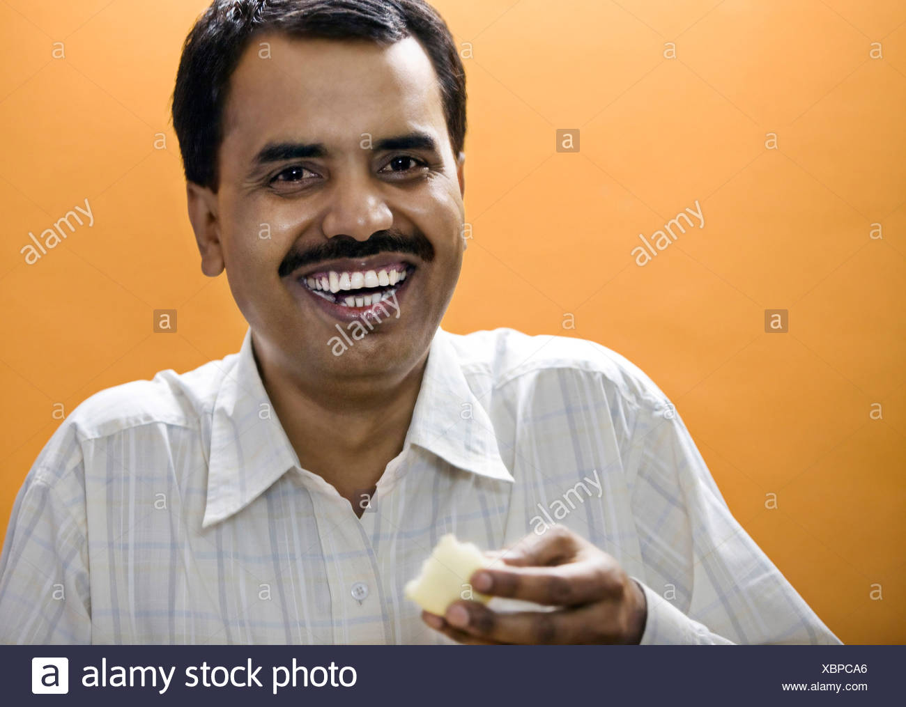 Indian Man Eating Sweet High Resolution Stock Photography and Images ...