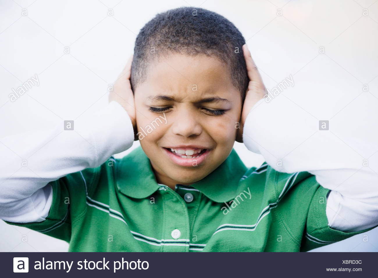 Boy Hands Over Ears High Resolution Stock Photography and Images - Alamy