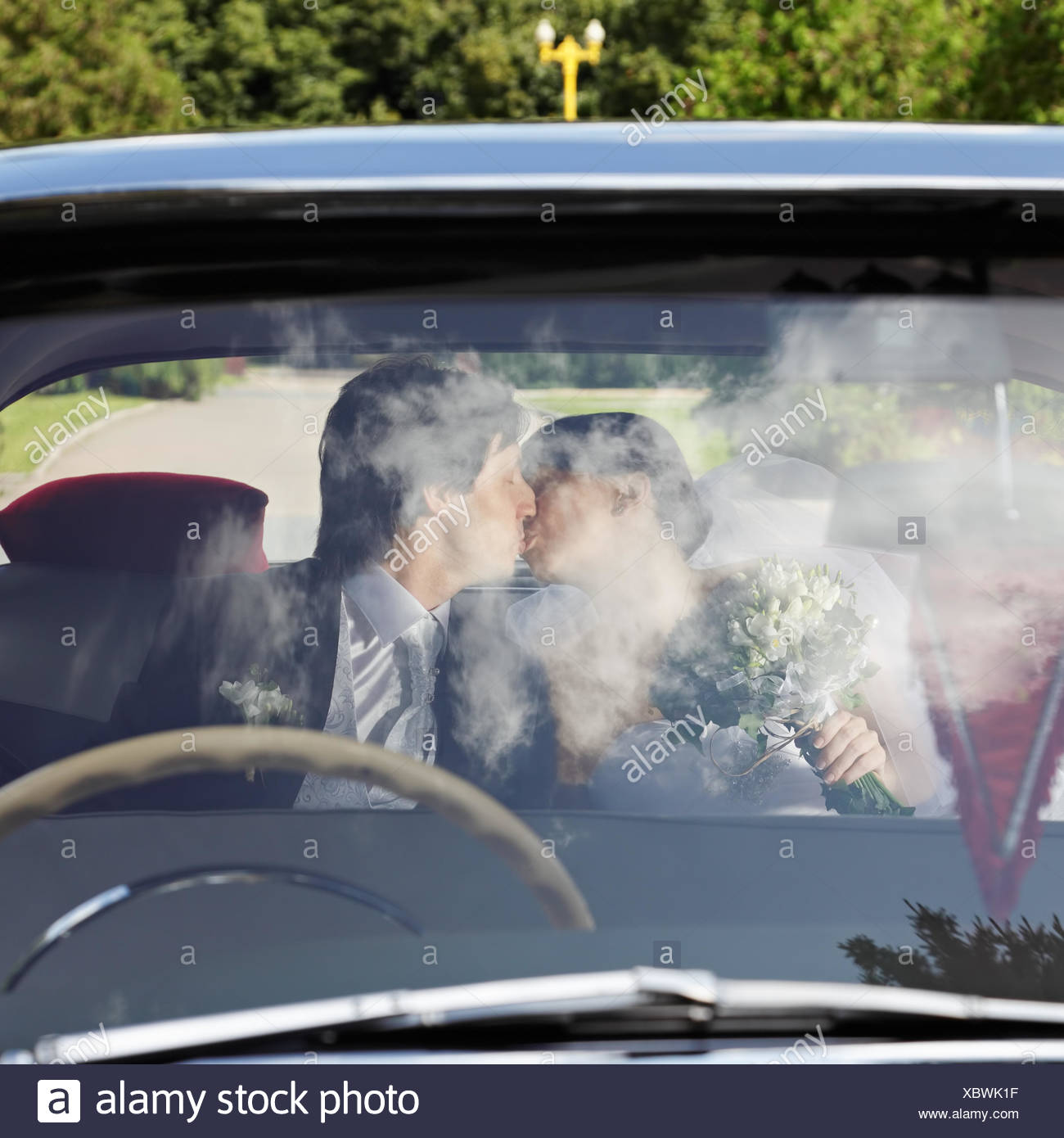 Male Female Car Kissing High Resolution Stock Photography and Images ...