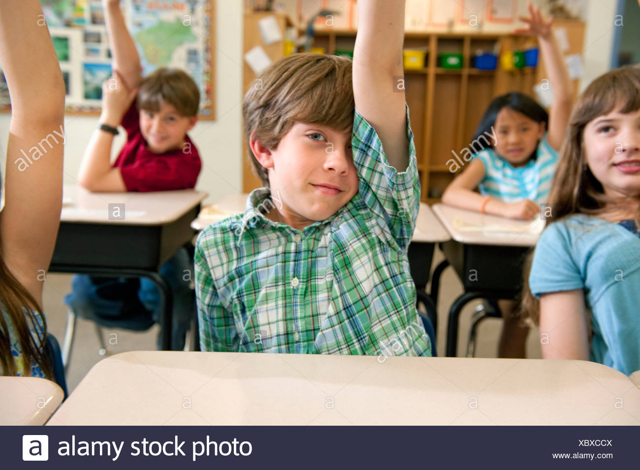 Hands Up In Class High Resolution Stock Photography and Images - Alamy