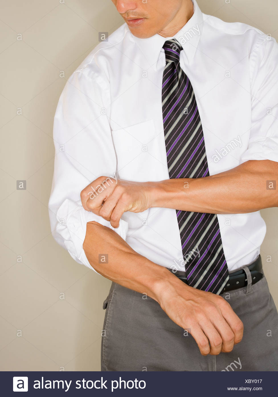 Rolled Up Shirt Sleeves Stock Photos & Rolled Up Shirt Sleeves Stock ...