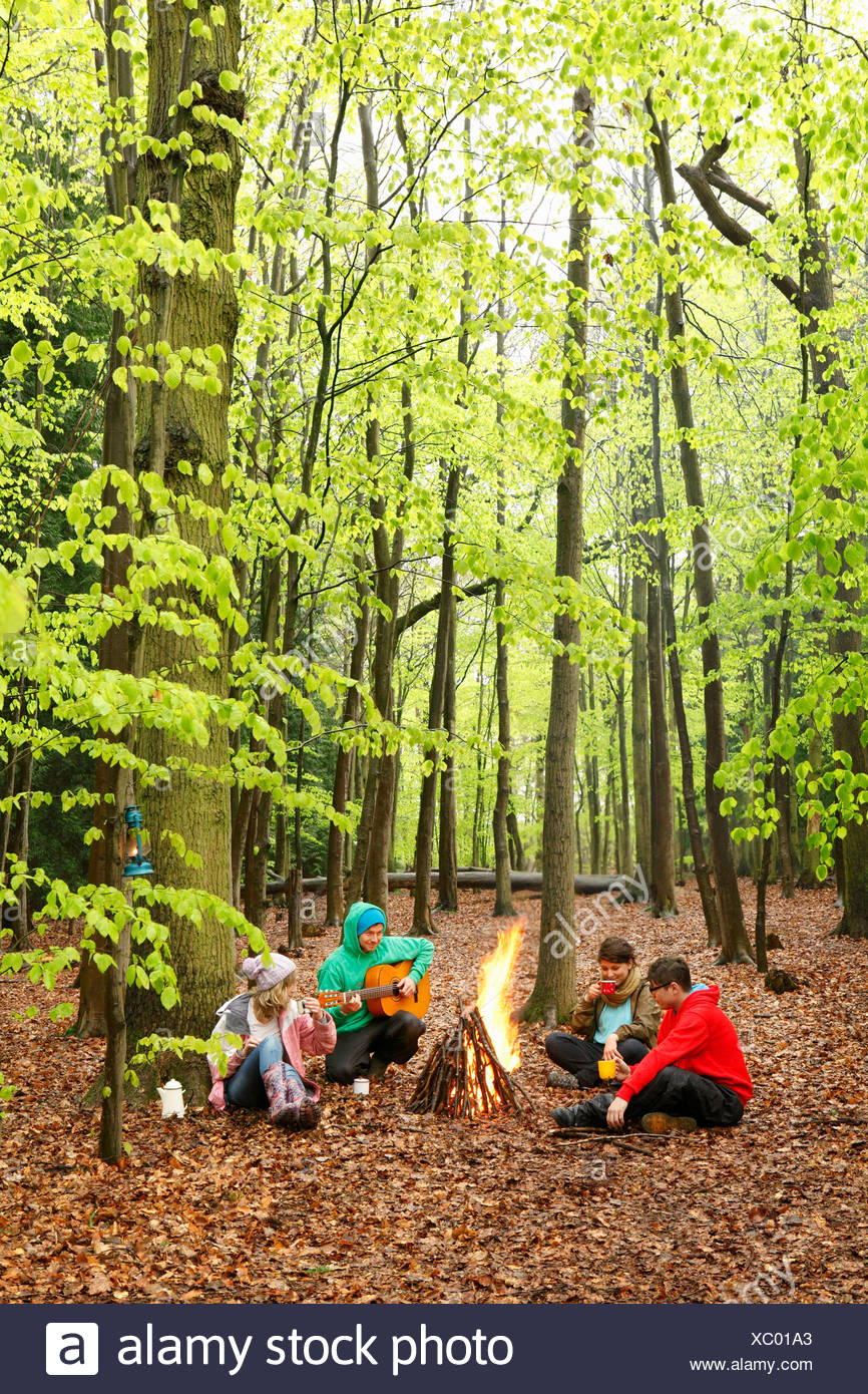 Friends Around Campfire High Resolution Stock Photography and Images ...