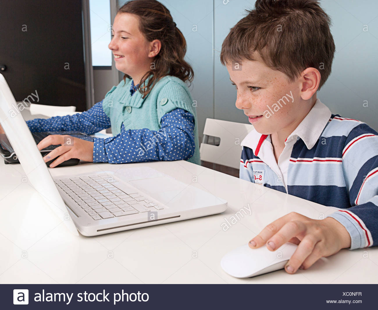 Child Helping Another Child High Resolution Stock Photography and ...